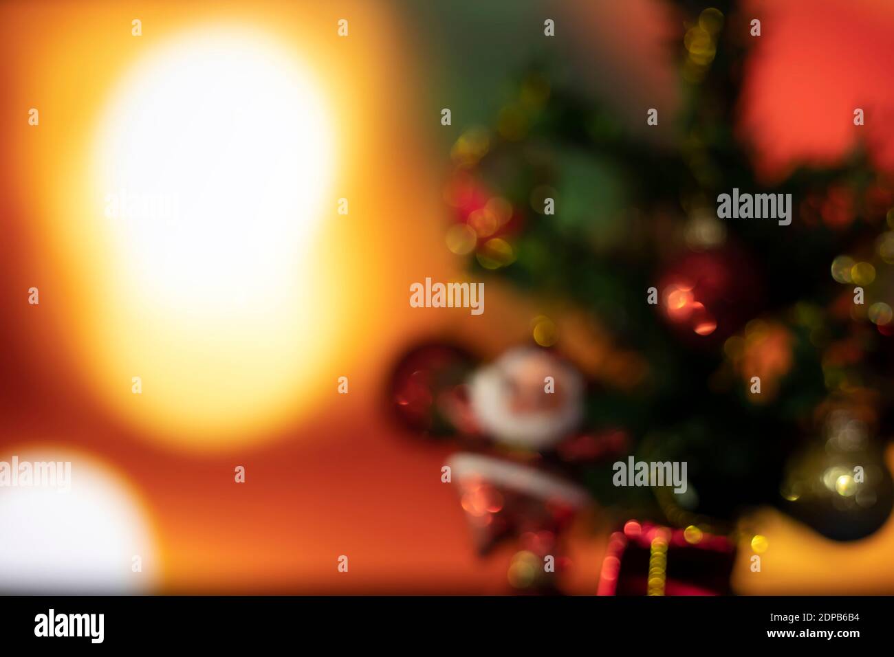 Christmas tree decorated on a dim backgrounds Stock Photo - Alamy