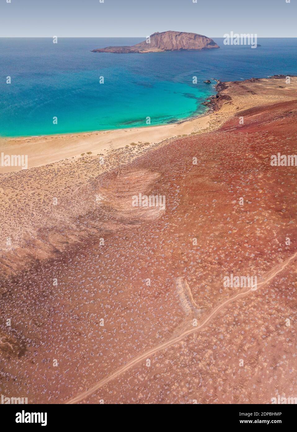 Aerial view of the Playa de las Conchas and mountain Bermeja, La ...