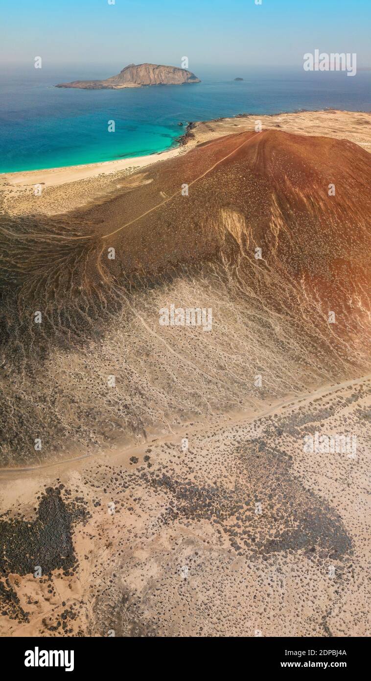 Aerial view of the Playa de las Conchas and mountain Bermeja, La ...