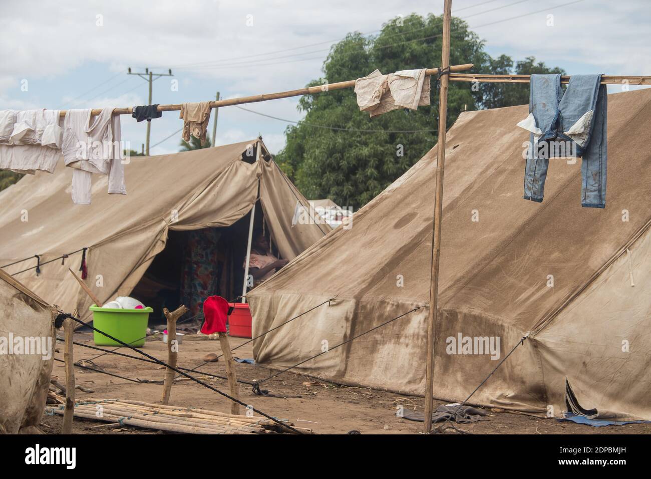 Refugee camp made of tents, people living in very poor conditions, lack ...