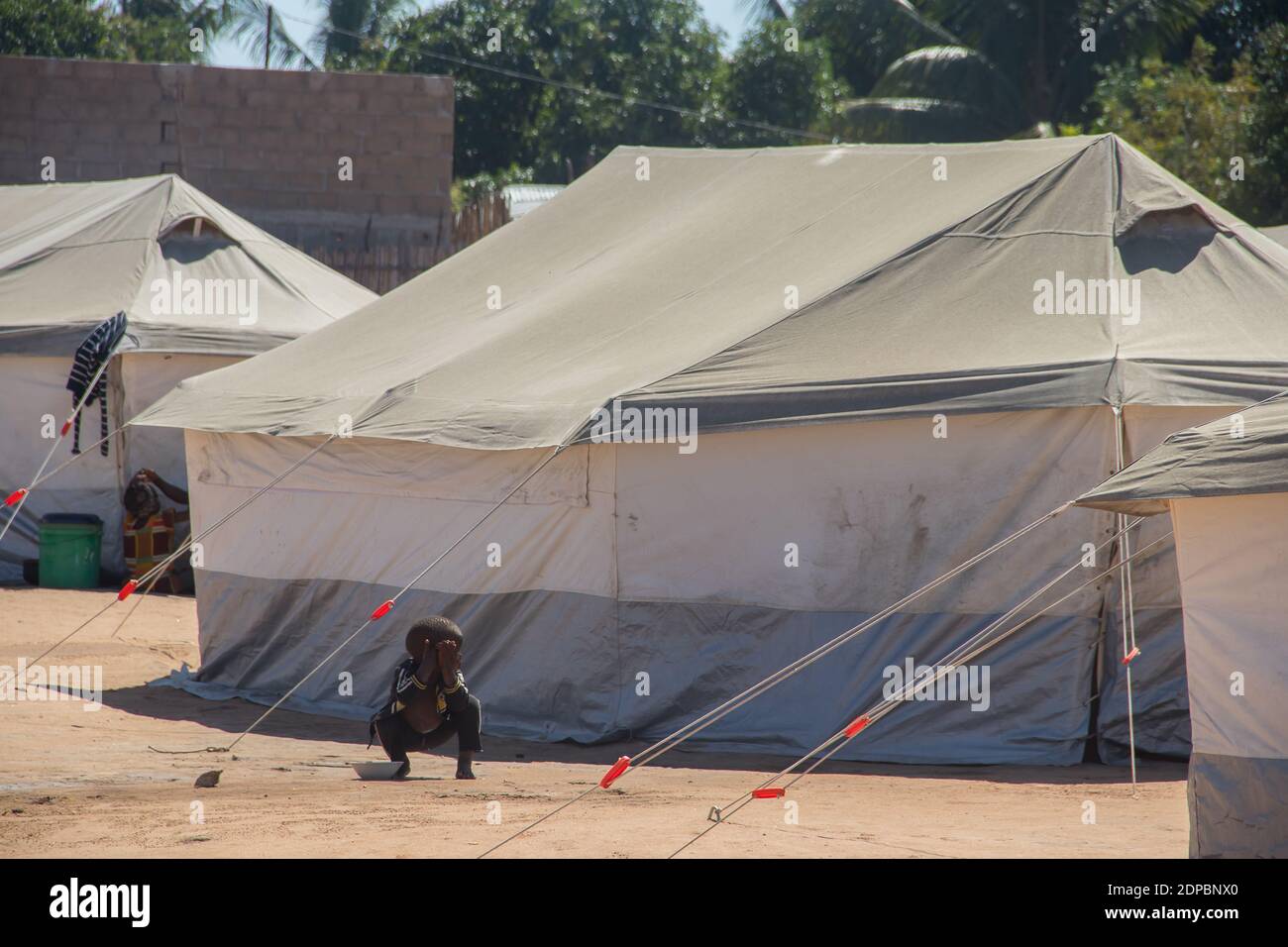 Refugee camp made of tents, people living in very poor conditions, lack ...