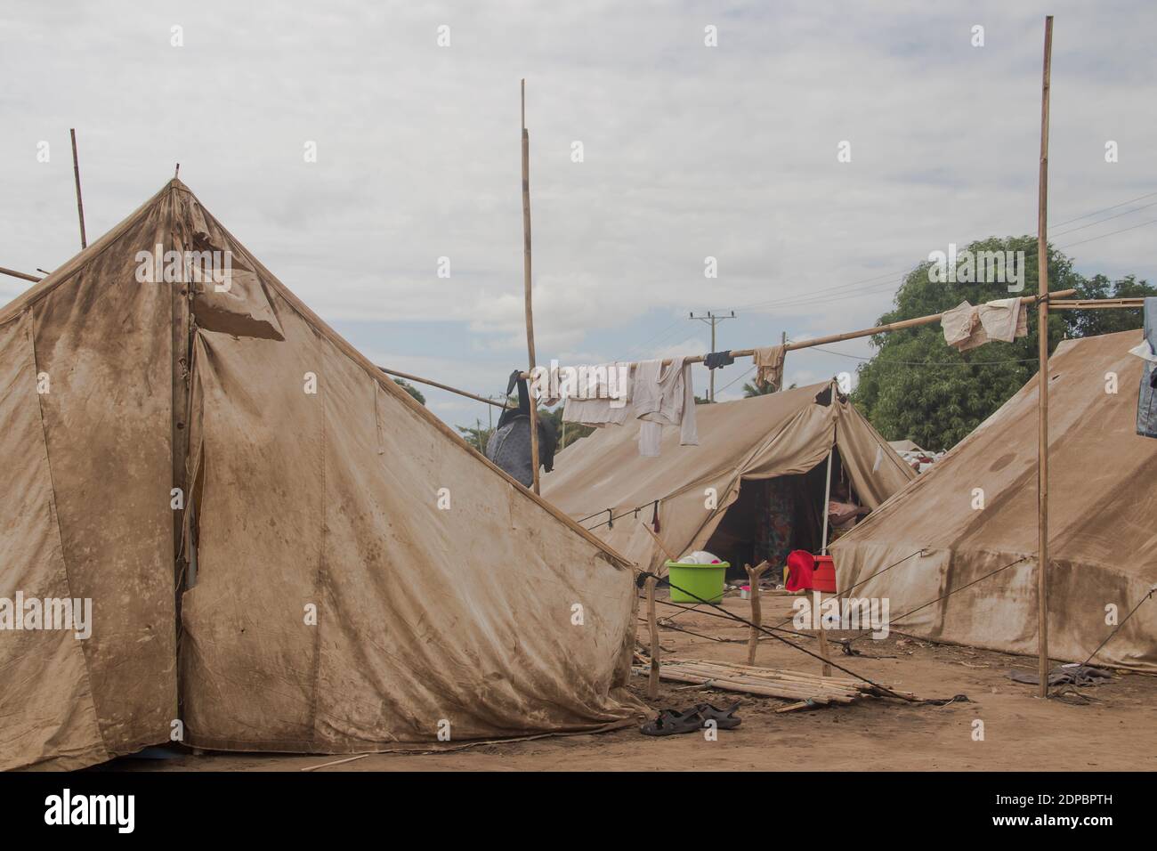 Refugee camp made of tents, people living in very poor conditions, lack ...