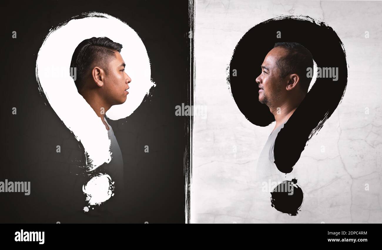 Man with question mark on a balck and white background Stock Photo - Alamy