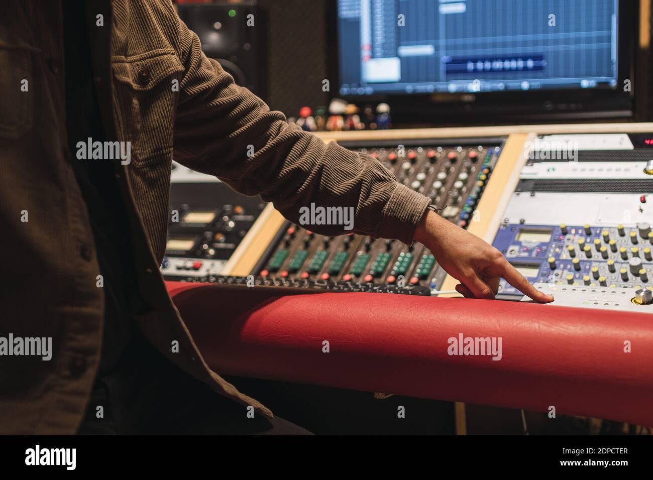 An audio engineer making a recording in the recording studio Stock ...