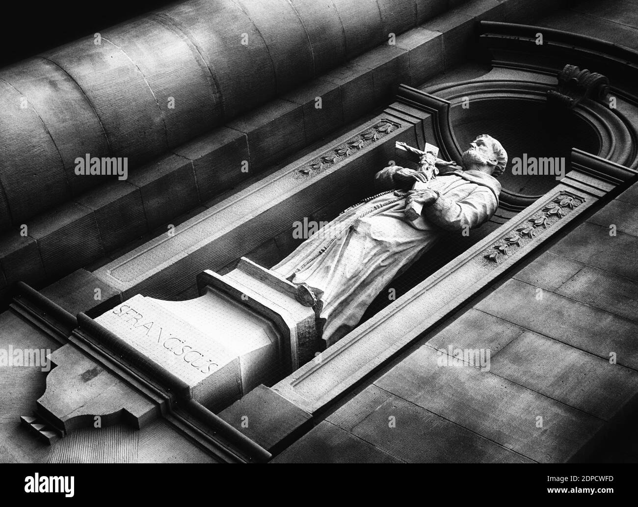 A grayscale of the statue of St. Francis of Assisi Stock Photo - Alamy