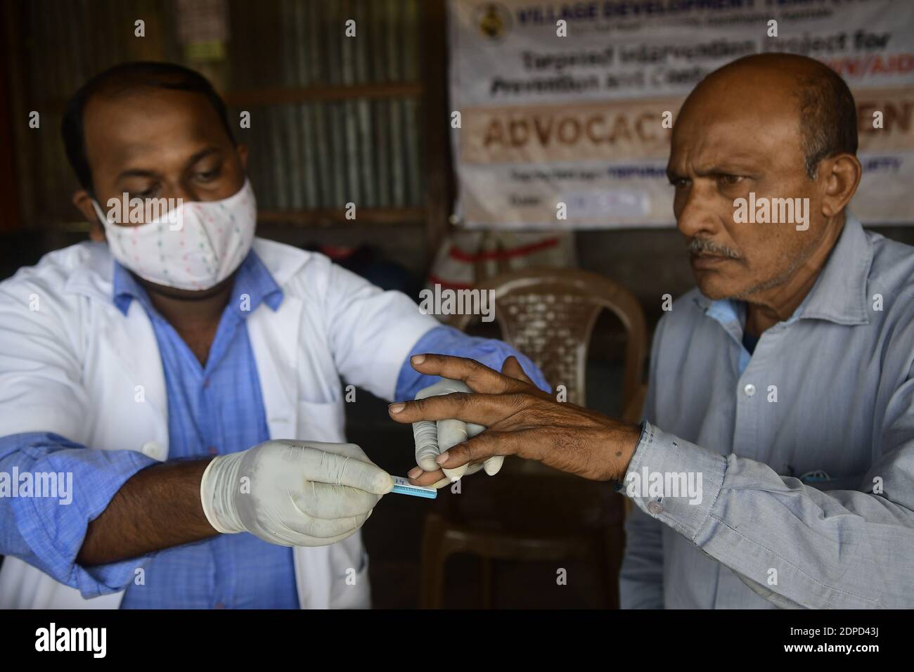 Blood test man india hi-res stock photography and images - Alamy