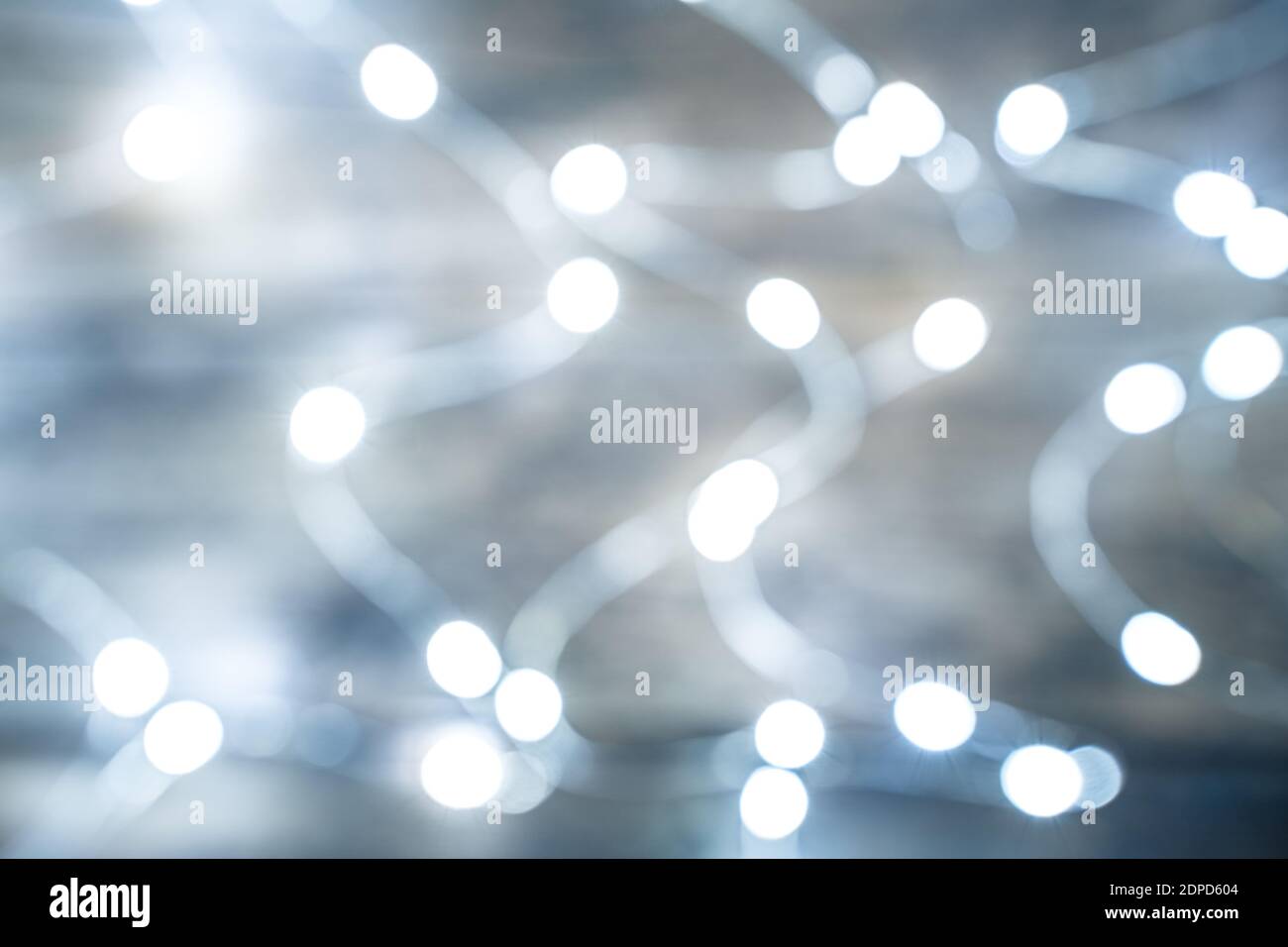 Burning lights garland on a wooden background. Side view Stock Photo ...