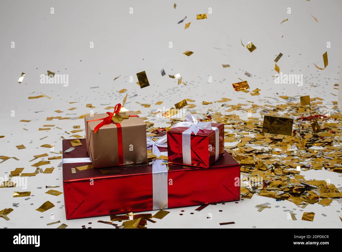 two little and one big boxes with an interesting gifts in a beautiful ...