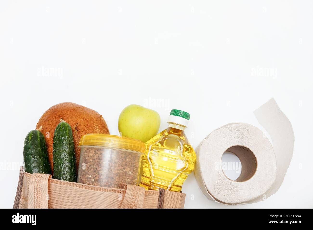 food donations in a bag on white background. product delivery concept ...