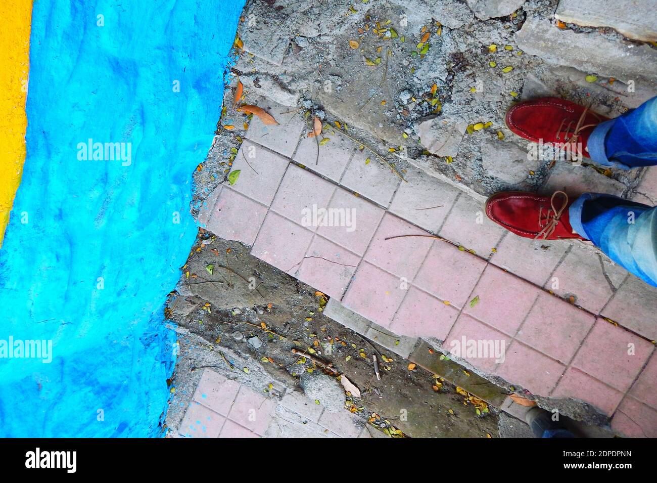 Low Section Of Person Standing On Floor Stock Photo - Alamy