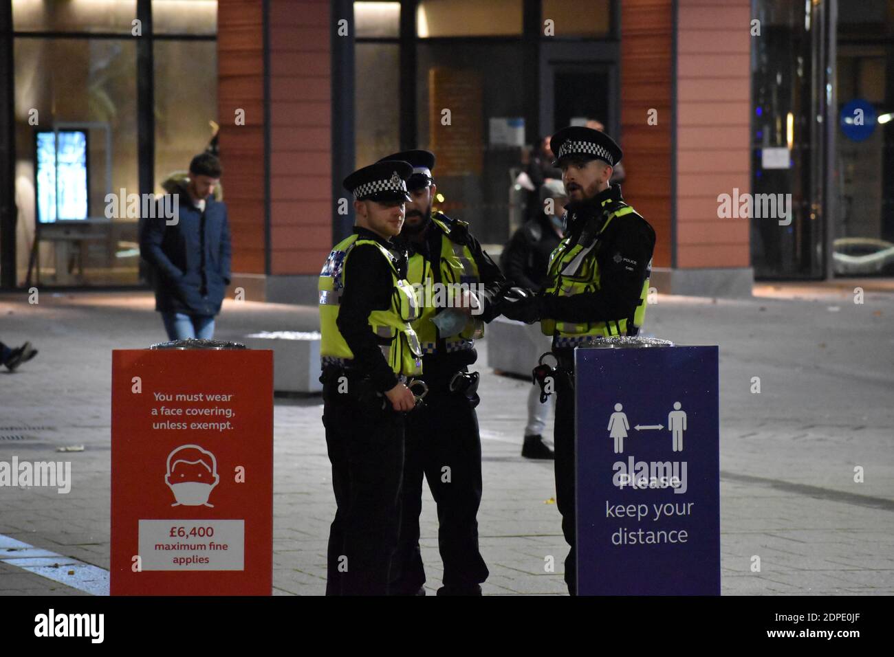 british transport police stand outside Reading train station next to ...