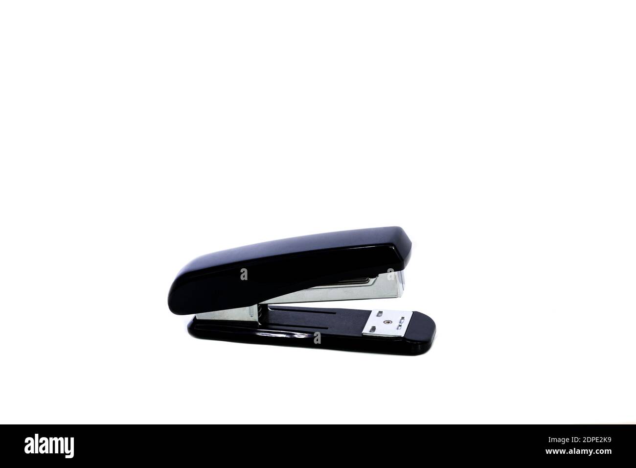 Black wire stapler on white background Stock Photo - Alamy