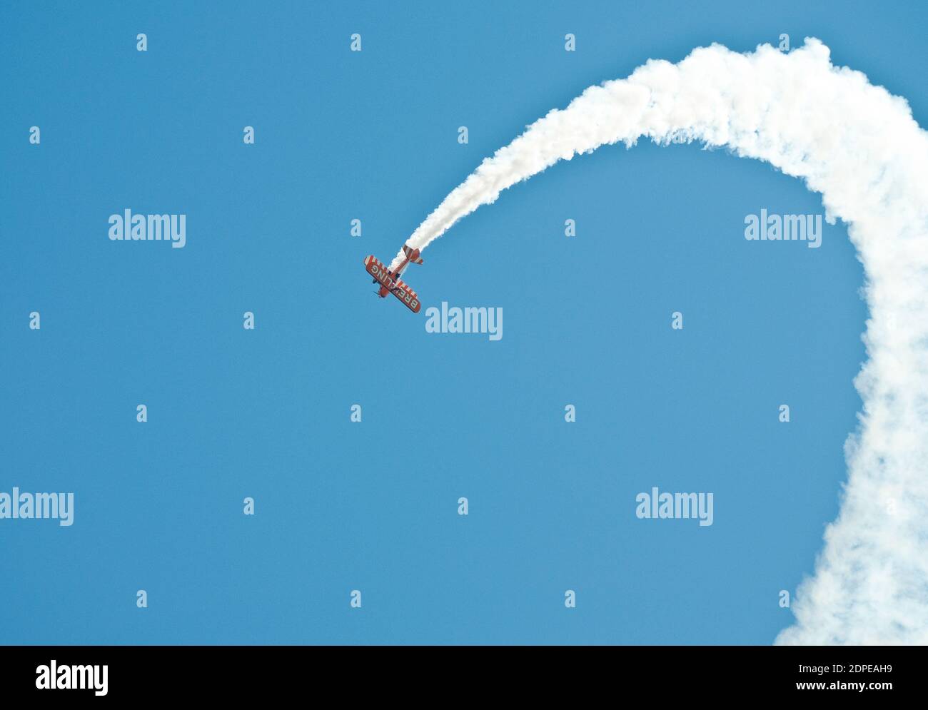 Breitling Wingwalking display team performing a loop Stock Photo - Alamy