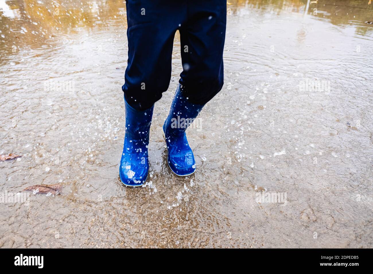 Boy Wearing Boots High Resolution Stock Photography and Images - Alamy