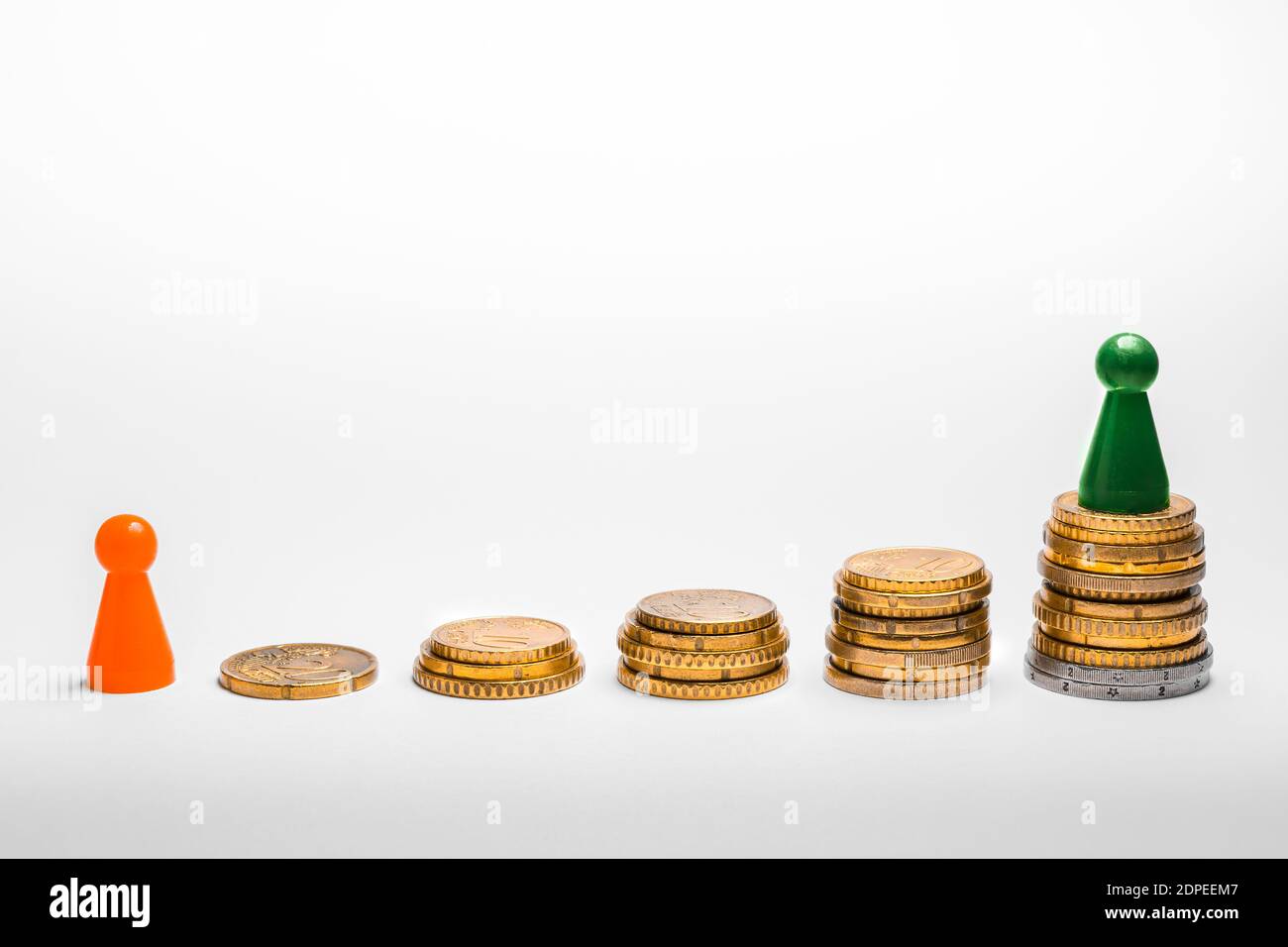 Stacked Coins And Token Games On White Background Stock Photo - Alamy