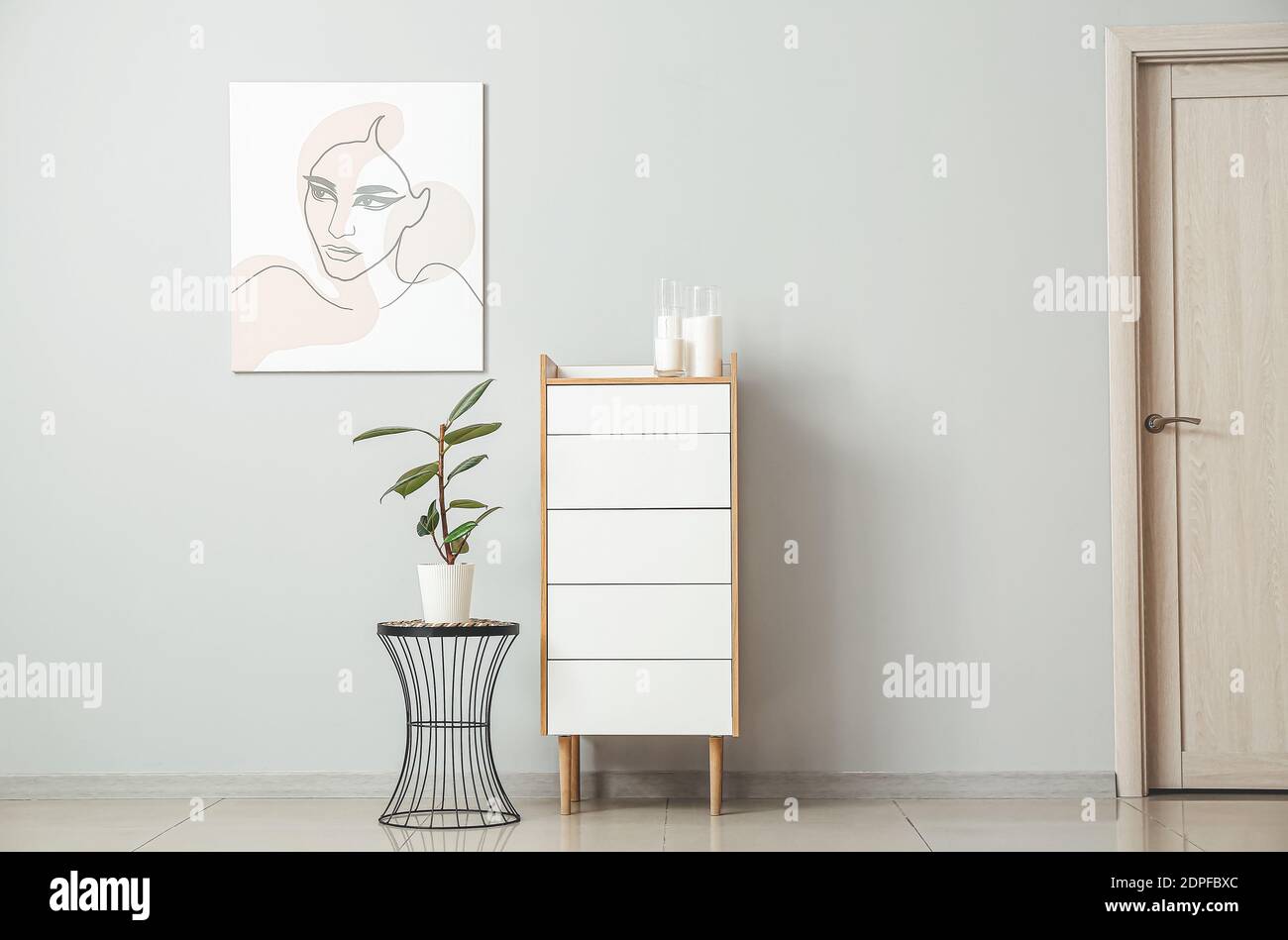 Modern interior of living room with chest of drawers Stock Photo - Alamy