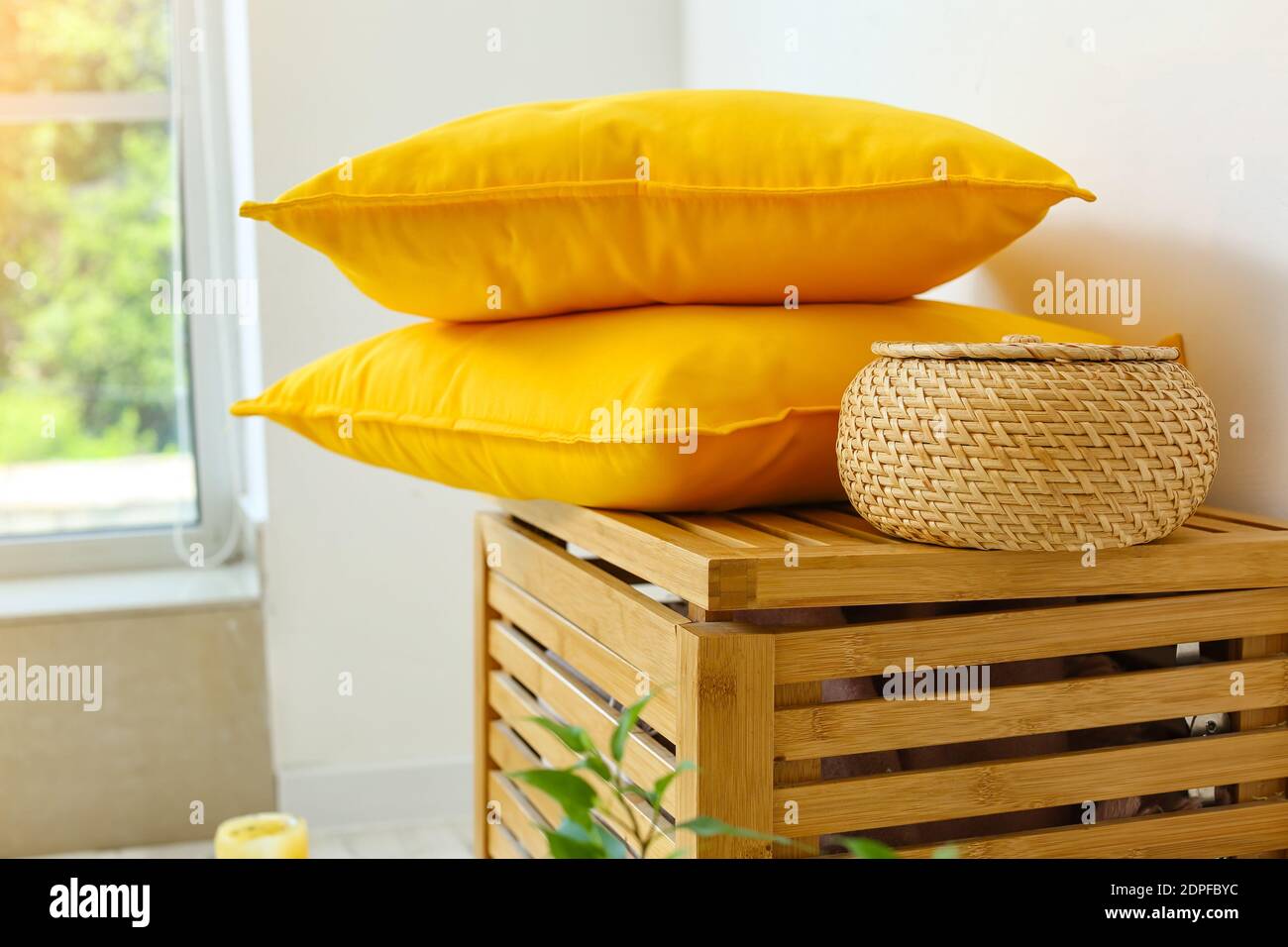 Pillows wooden chest drawers hi-res stock photography and images - Alamy