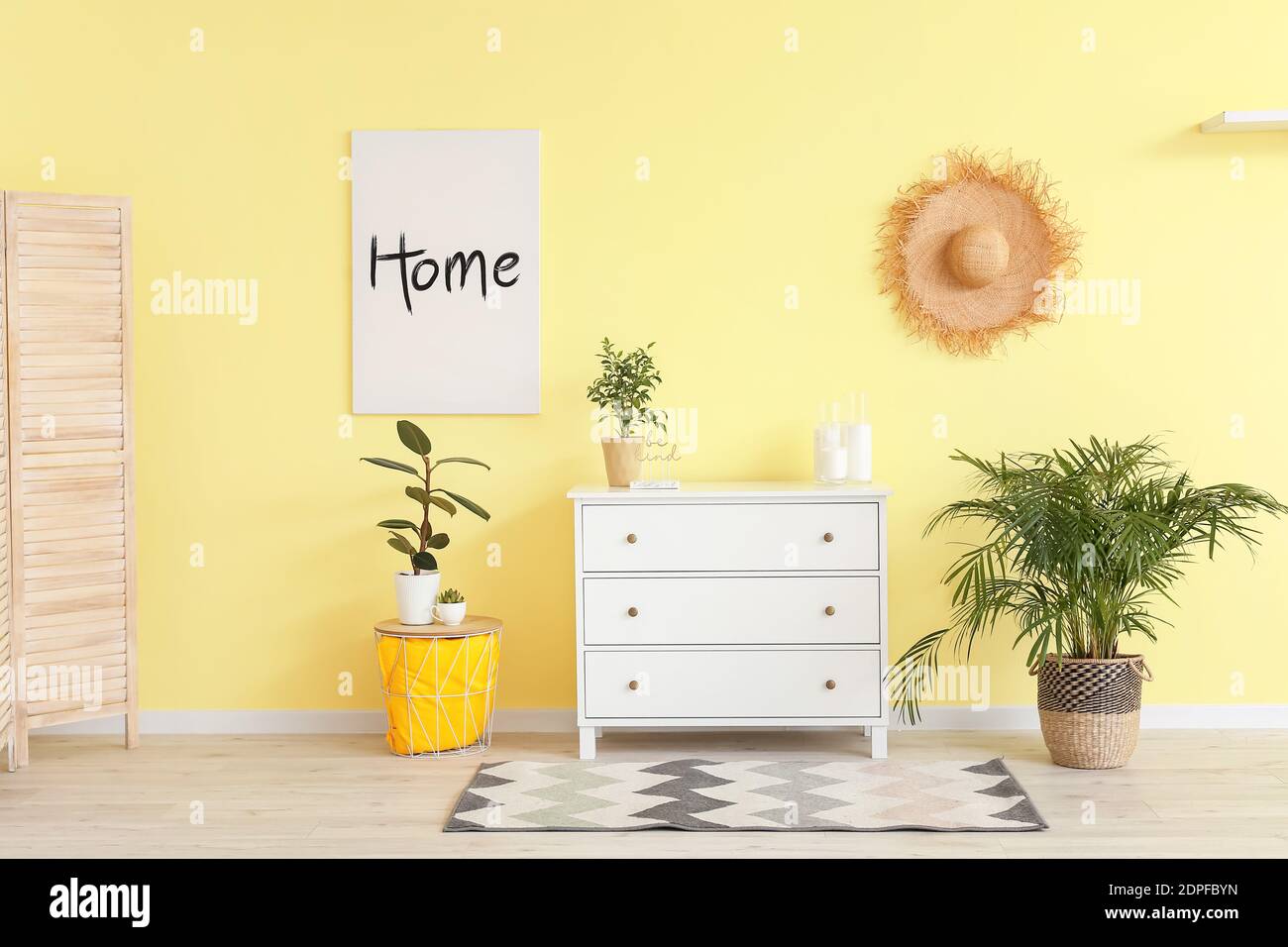 Interior of modern living room with chest of drawers Stock Photo - Alamy