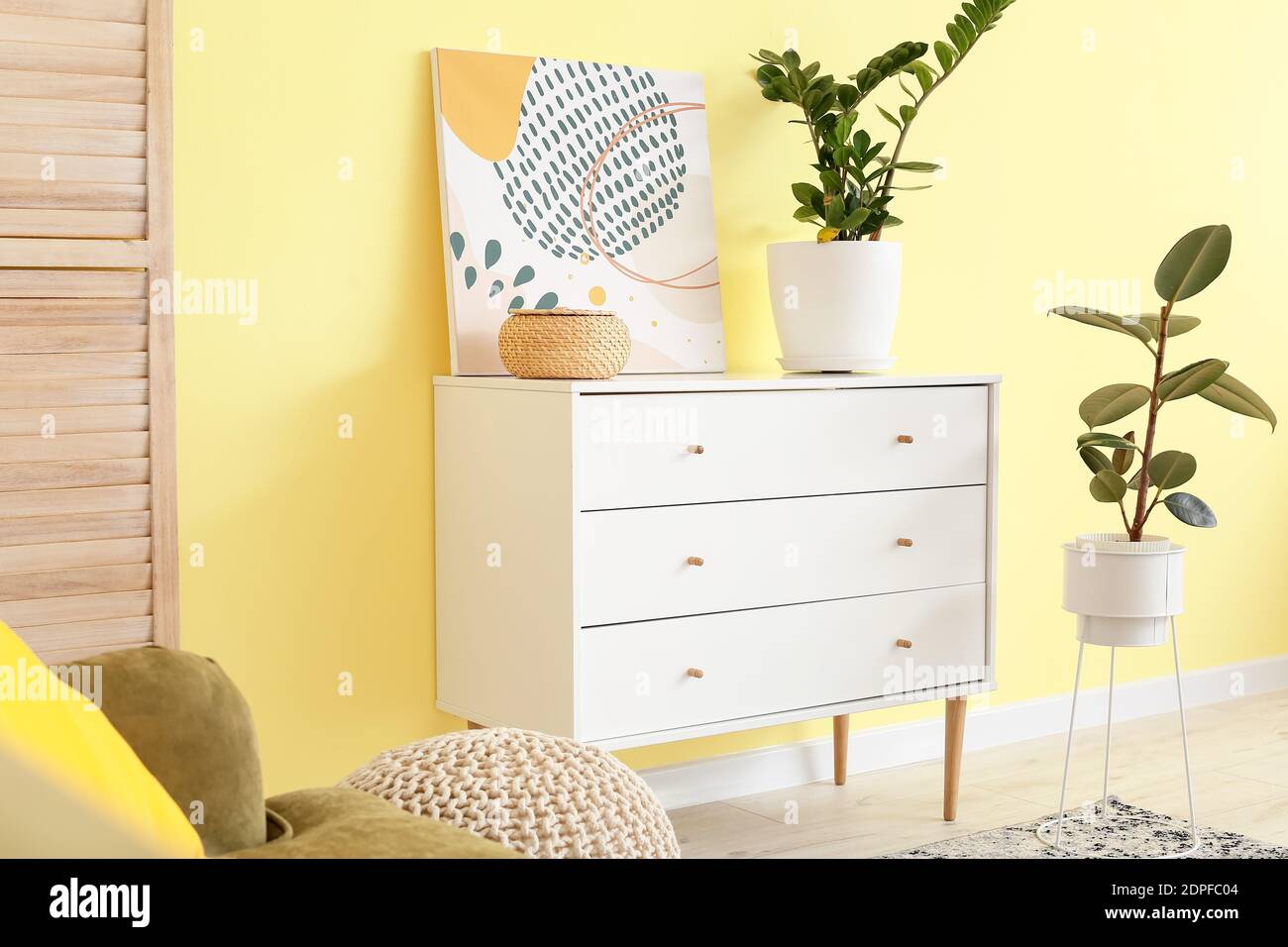 Interior of modern living room with chest of drawers Stock Photo - Alamy