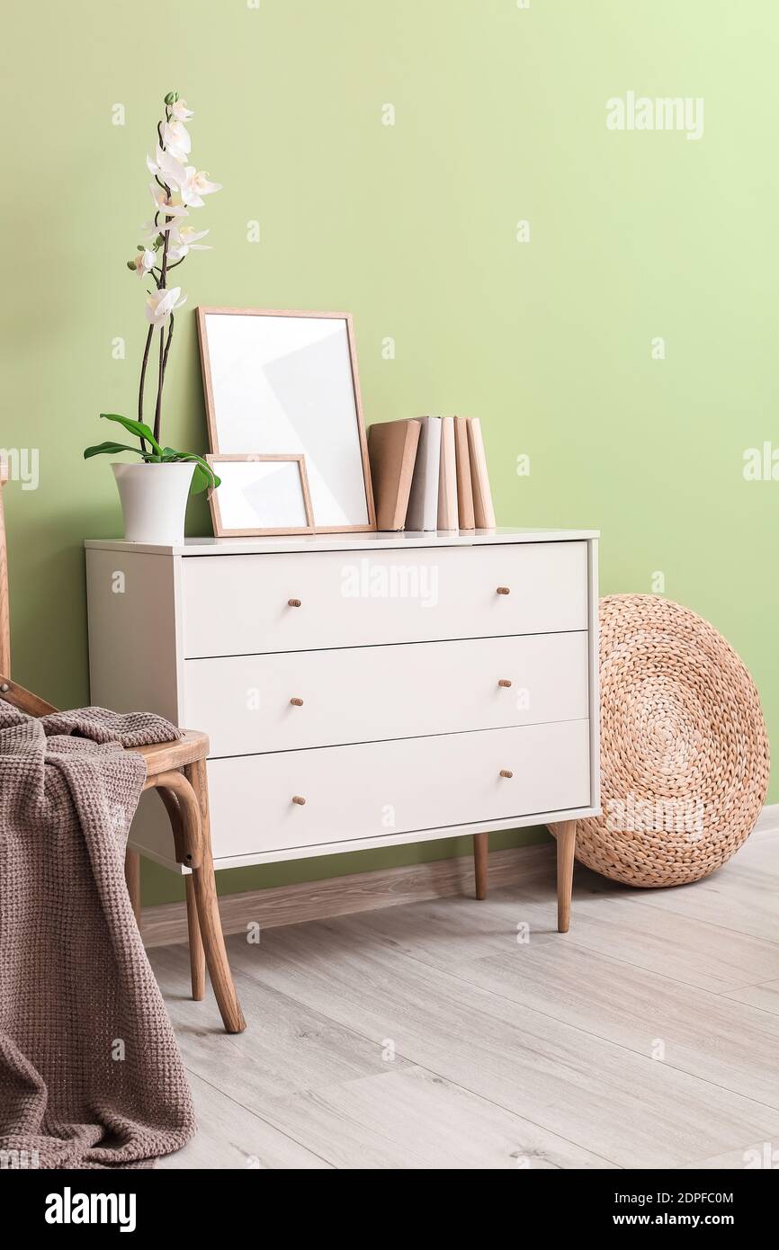 Interior of modern living room with chest of drawers Stock Photo - Alamy