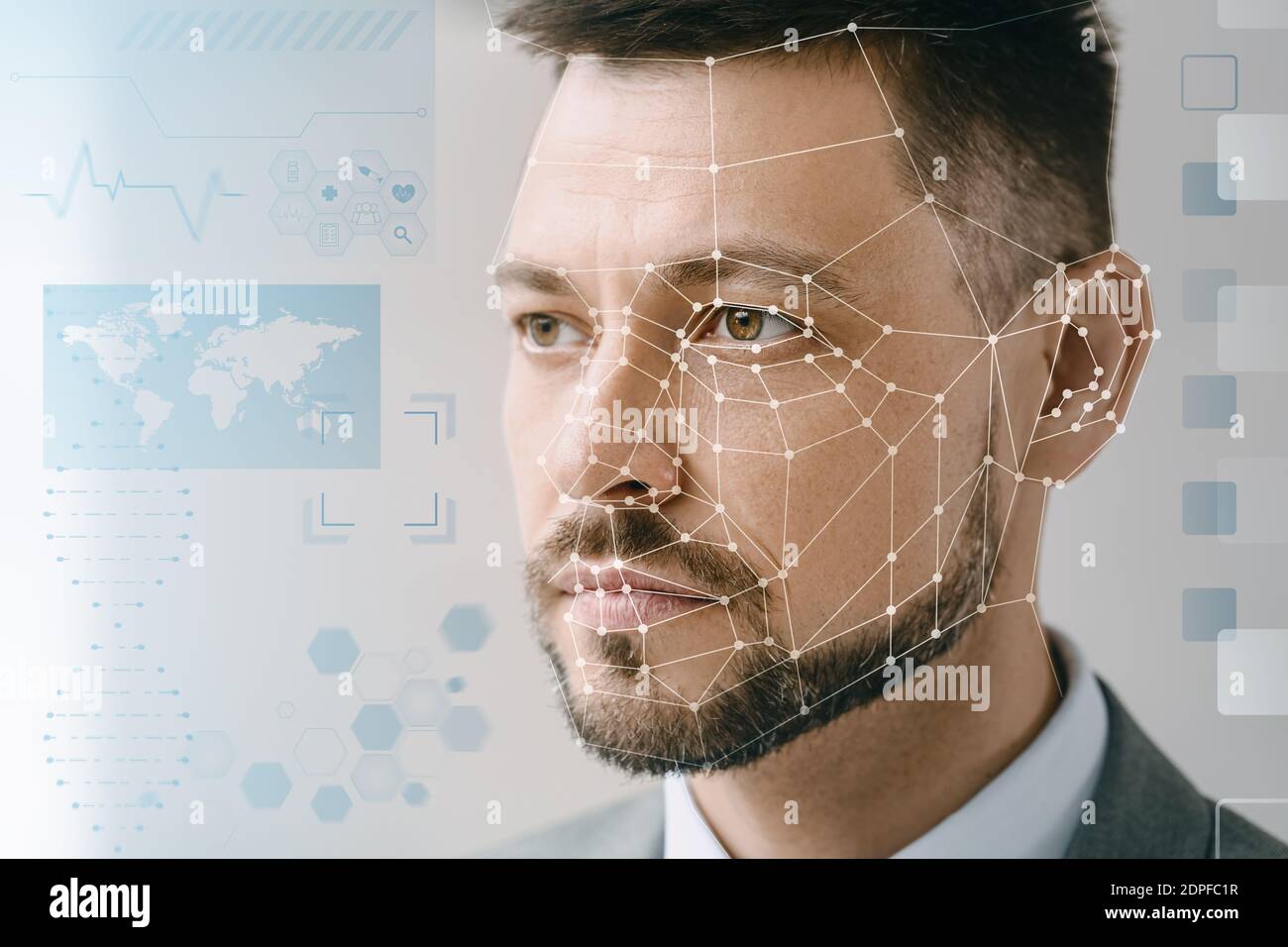 Man with face scanning on light background Stock Photo - Alamy