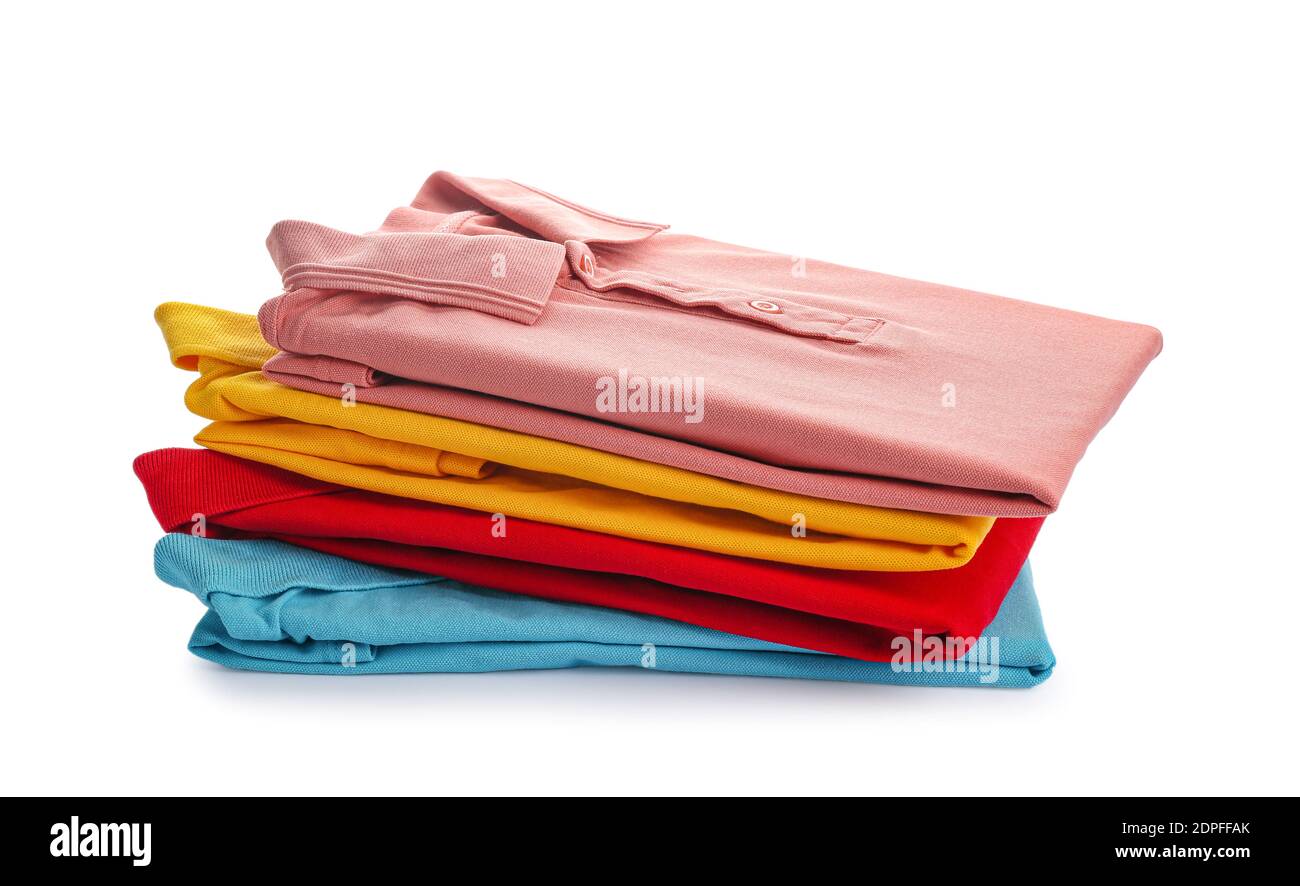 Stack of male shirts on white background Stock Photo - Alamy