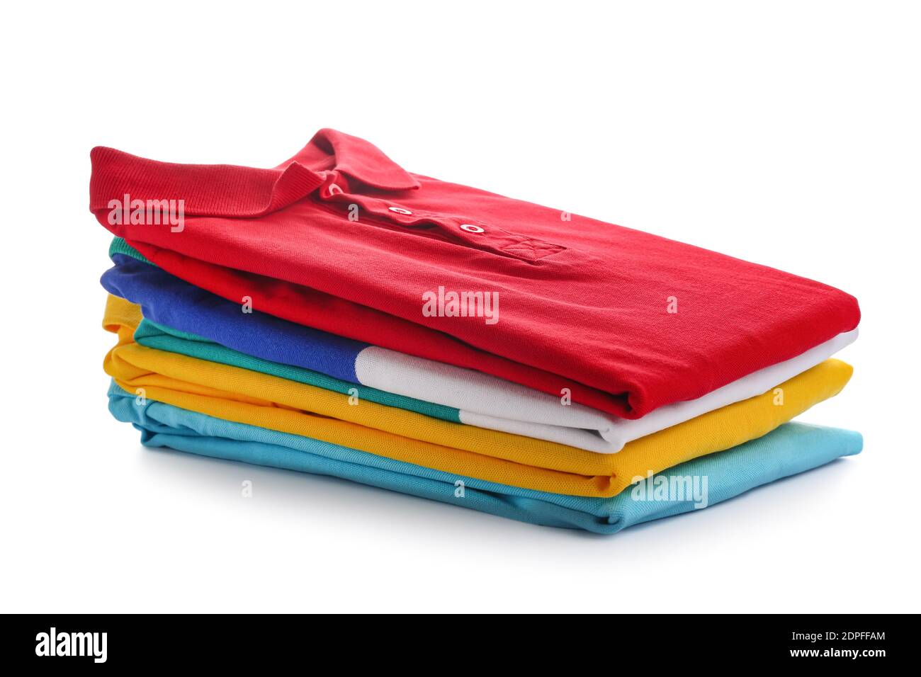 Stack of male shirts on white background Stock Photo - Alamy