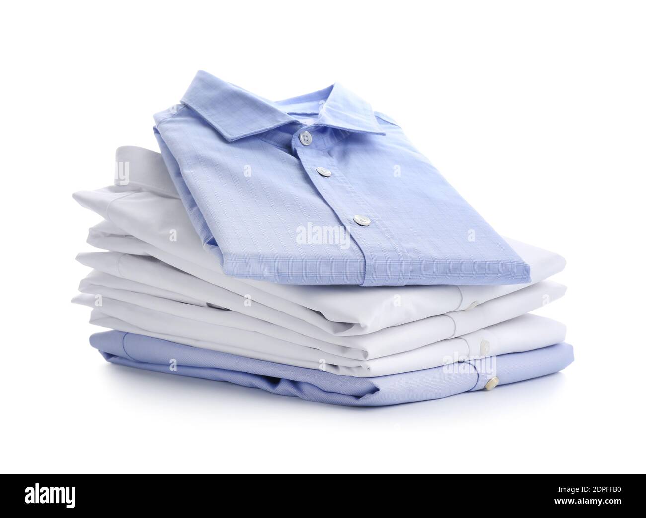 Stack of male shirts on white background Stock Photo - Alamy