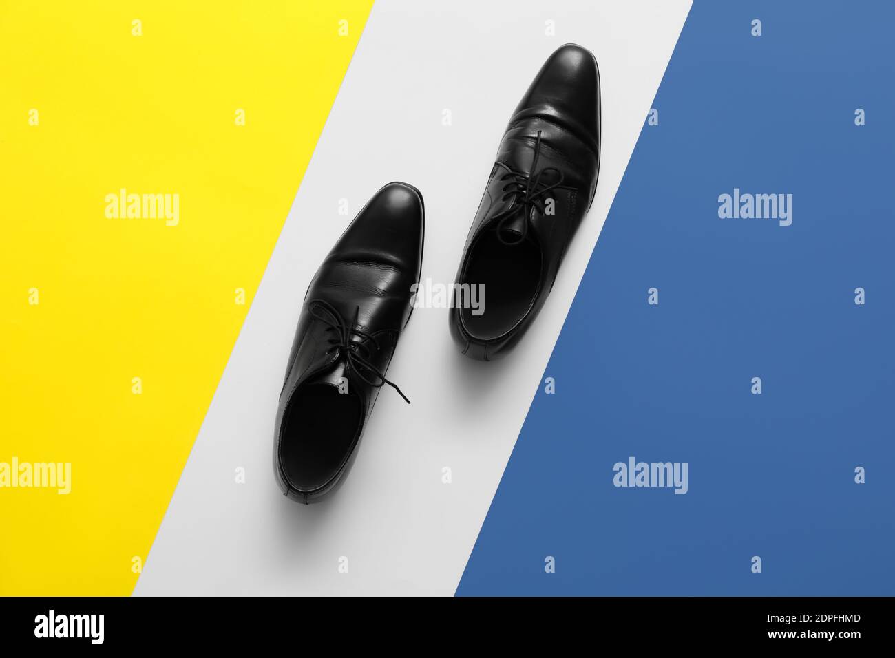 Classic leather male shoes on color background Stock Photo - Alamy