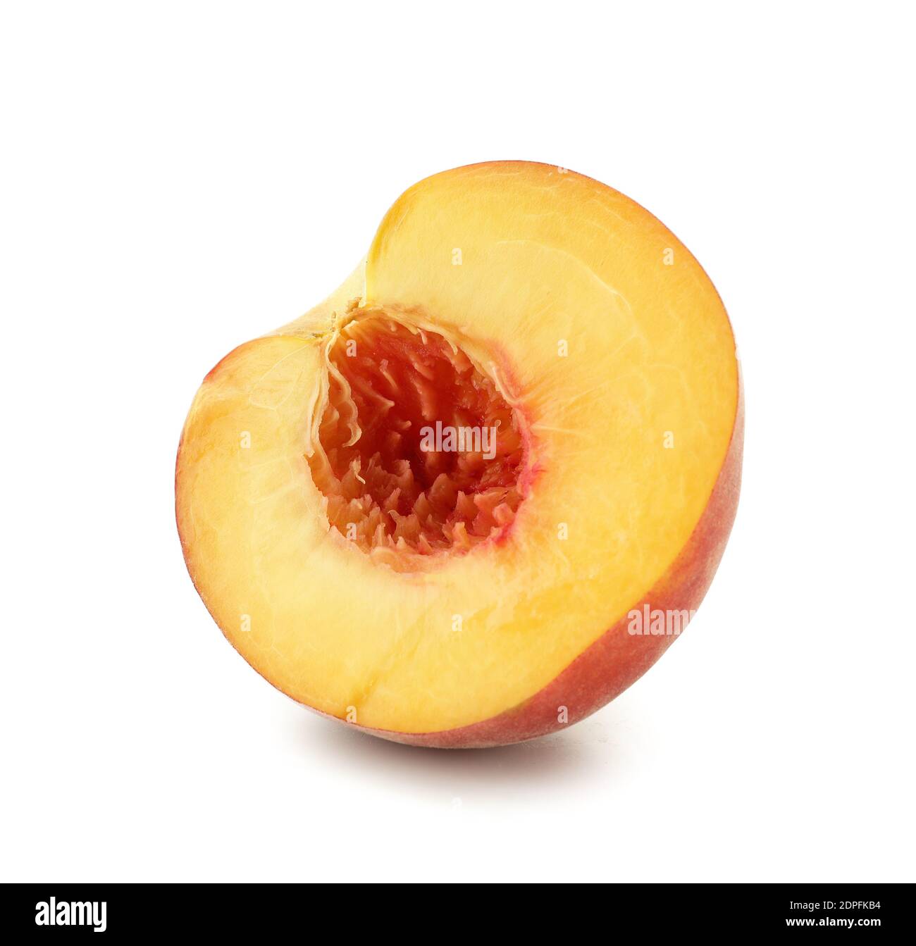 Sweet cut peach on white background Stock Photo - Alamy