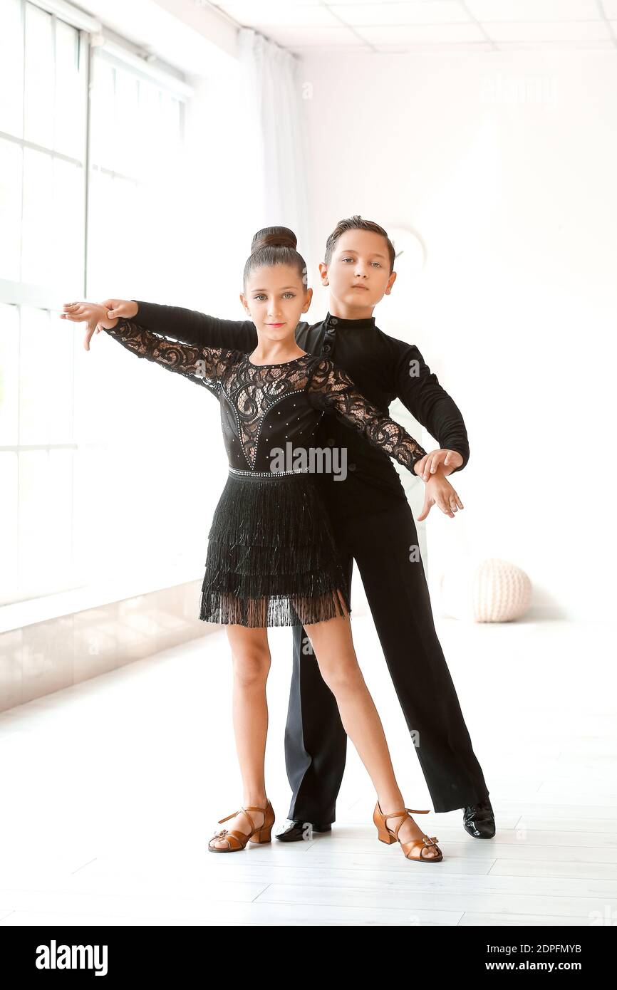 Cute little children dancing in studio Stock Photo - Alamy