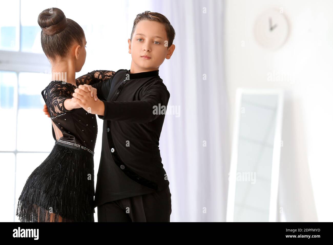 Cute little children dancing in studio Stock Photo - Alamy