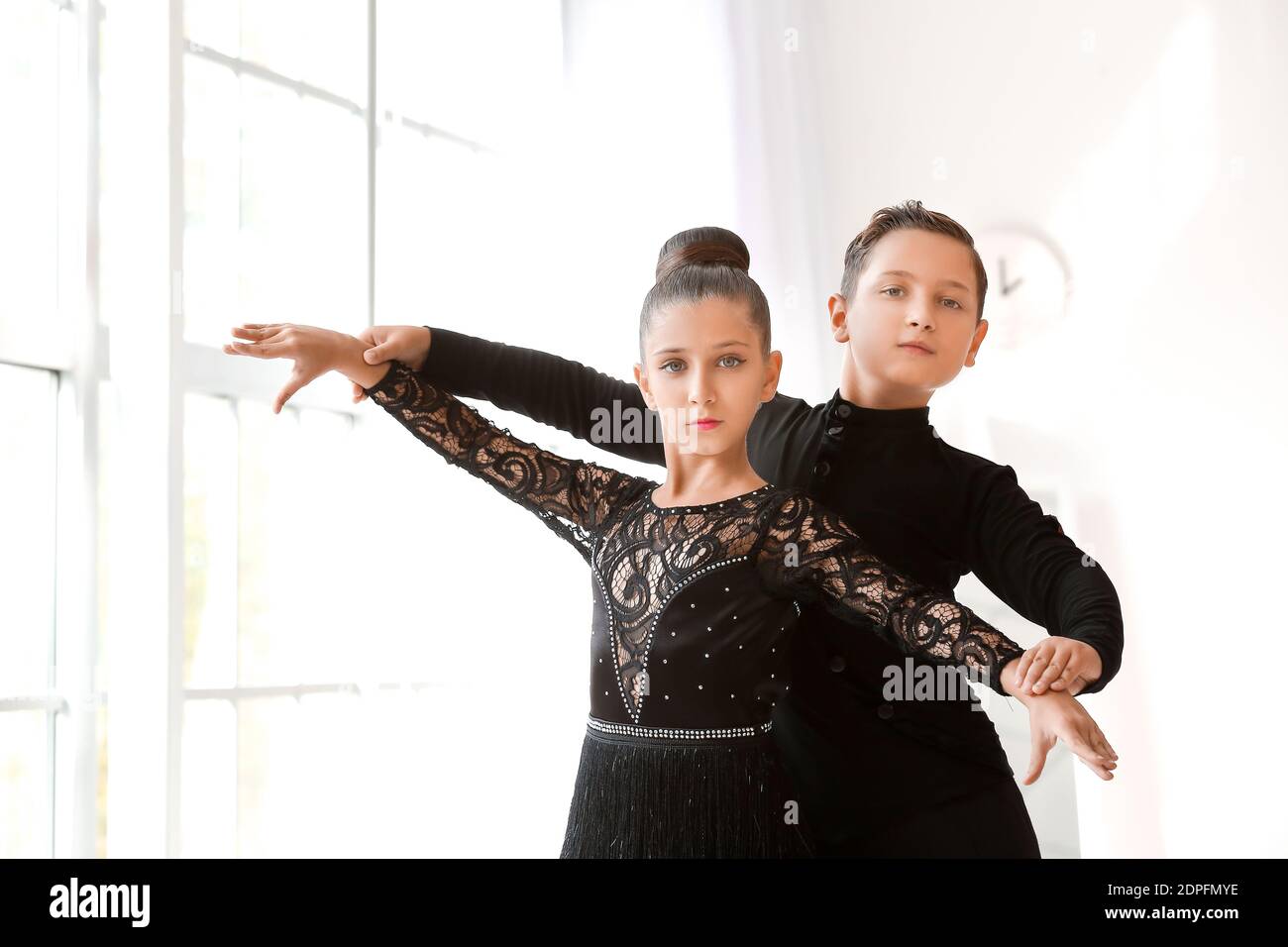 Cute little children dancing in studio Stock Photo - Alamy