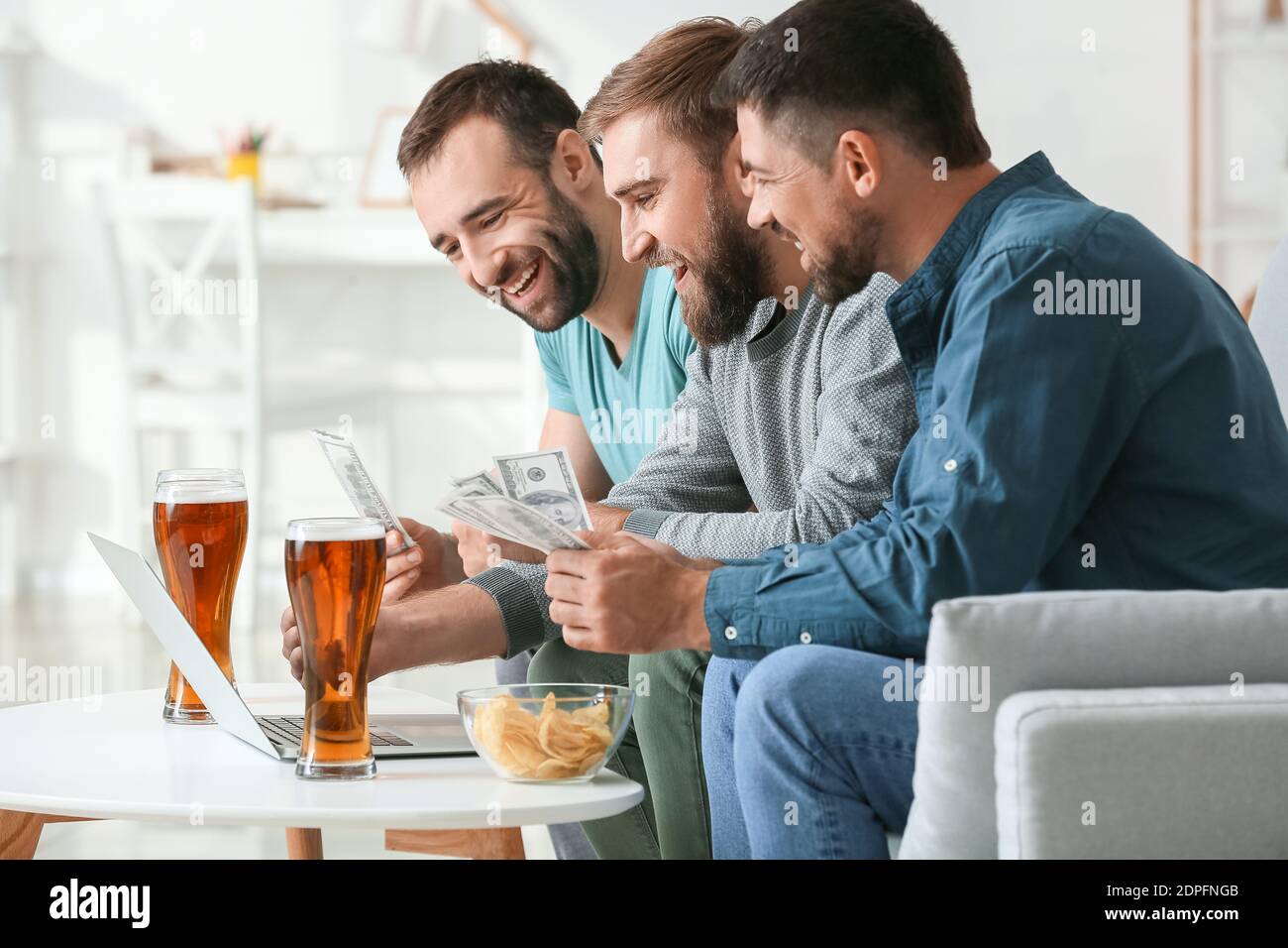 Man happy after winning lottery hi-res stock photography and images - Alamy