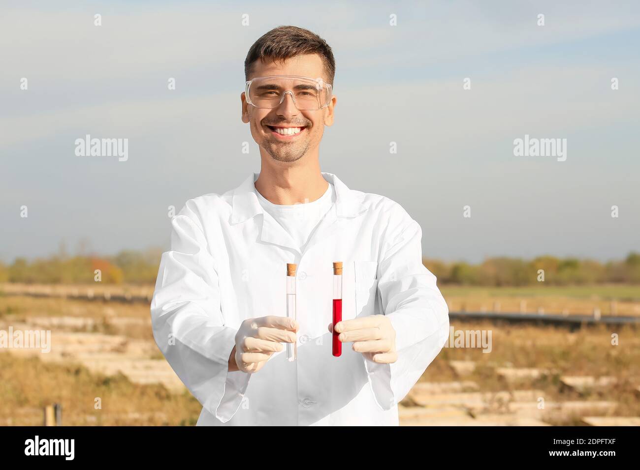 Scientist studying snails at the farm Stock Photo - Alamy