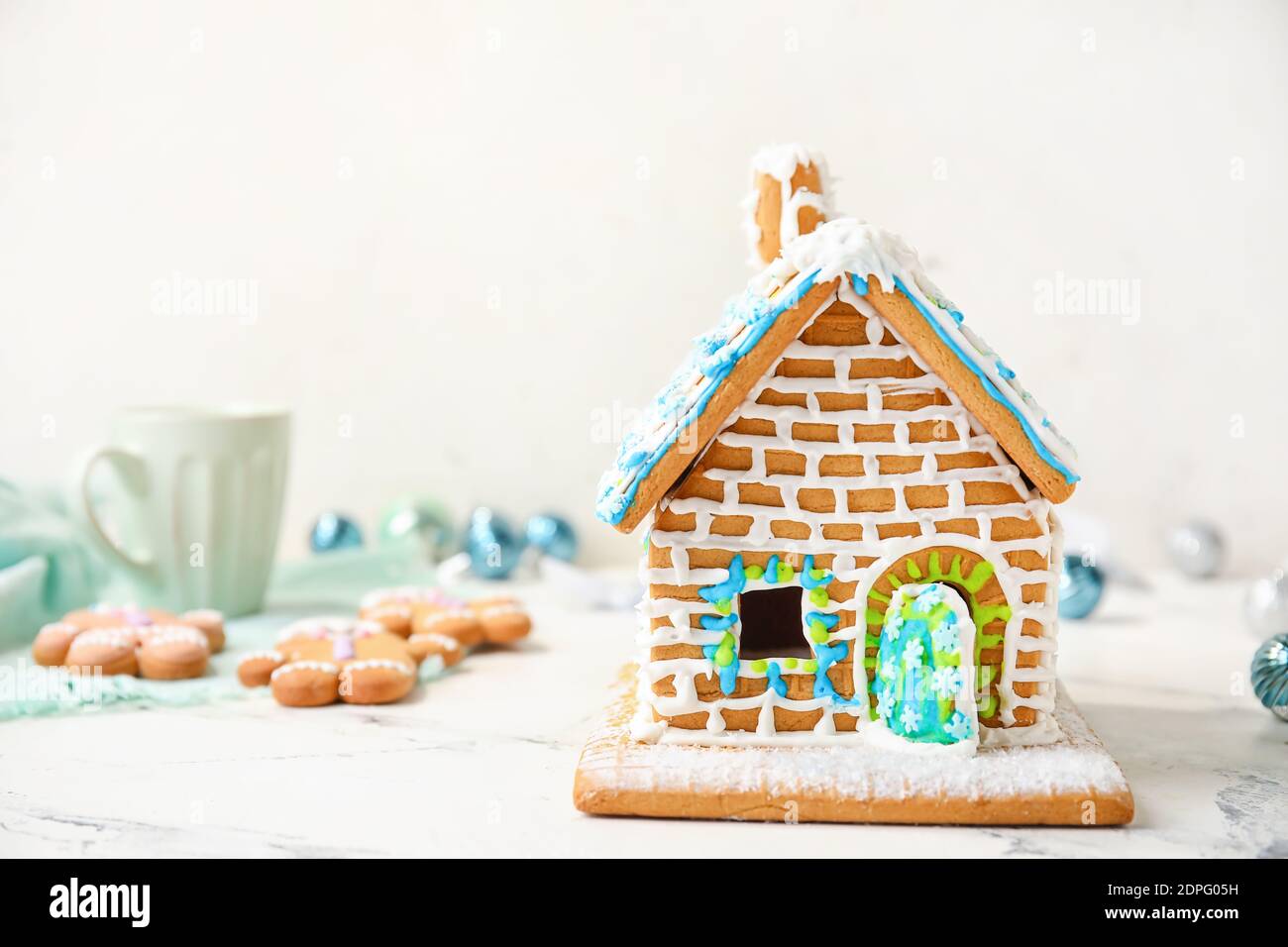 Beautiful gingerbread house on table Stock Photo - Alamy