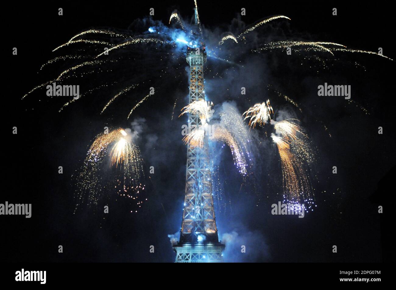 Fireworks explode around the Eiffel Tower during the annual Bastille Day celebration in Paris ...