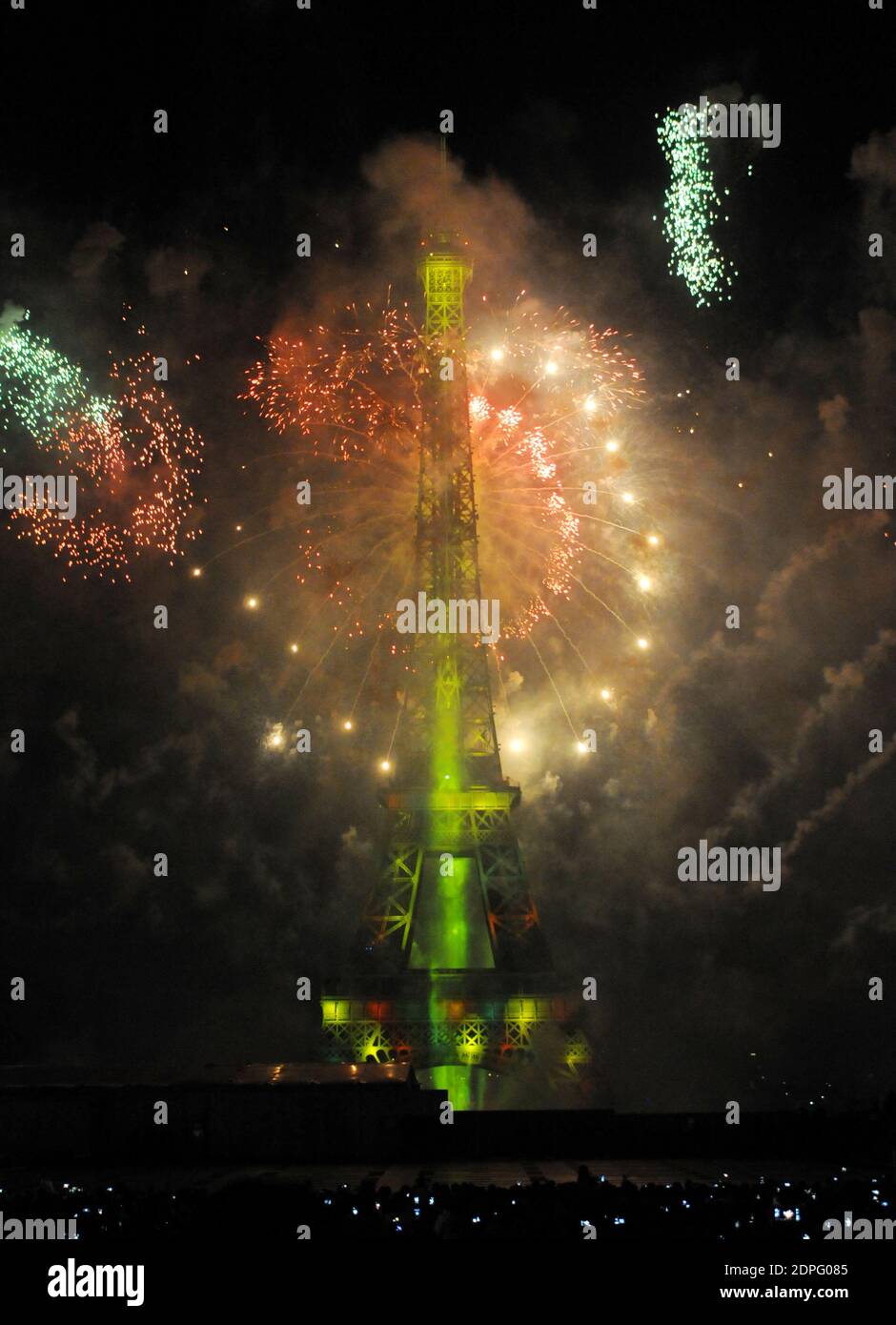 Fireworks explode around the Eiffel Tower during the annual Bastille Day celebration in Paris ...