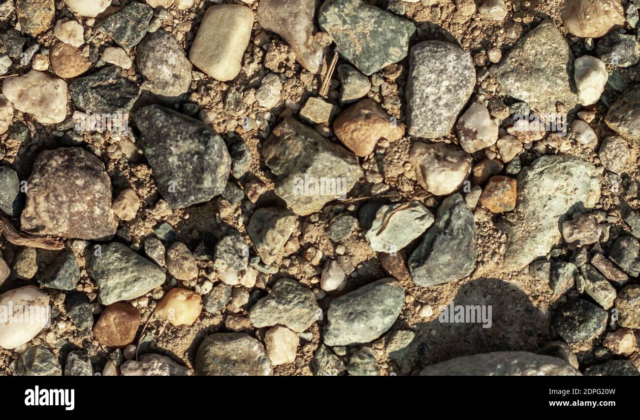colored stone texture on the ground Stock Photo - Alamy