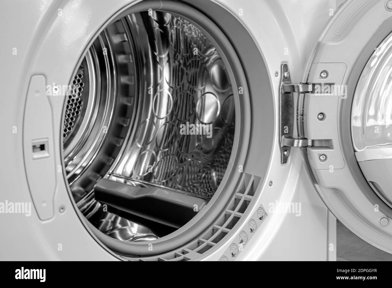 Front loading washing machine Black and White Stock Photos & Images - Alamy