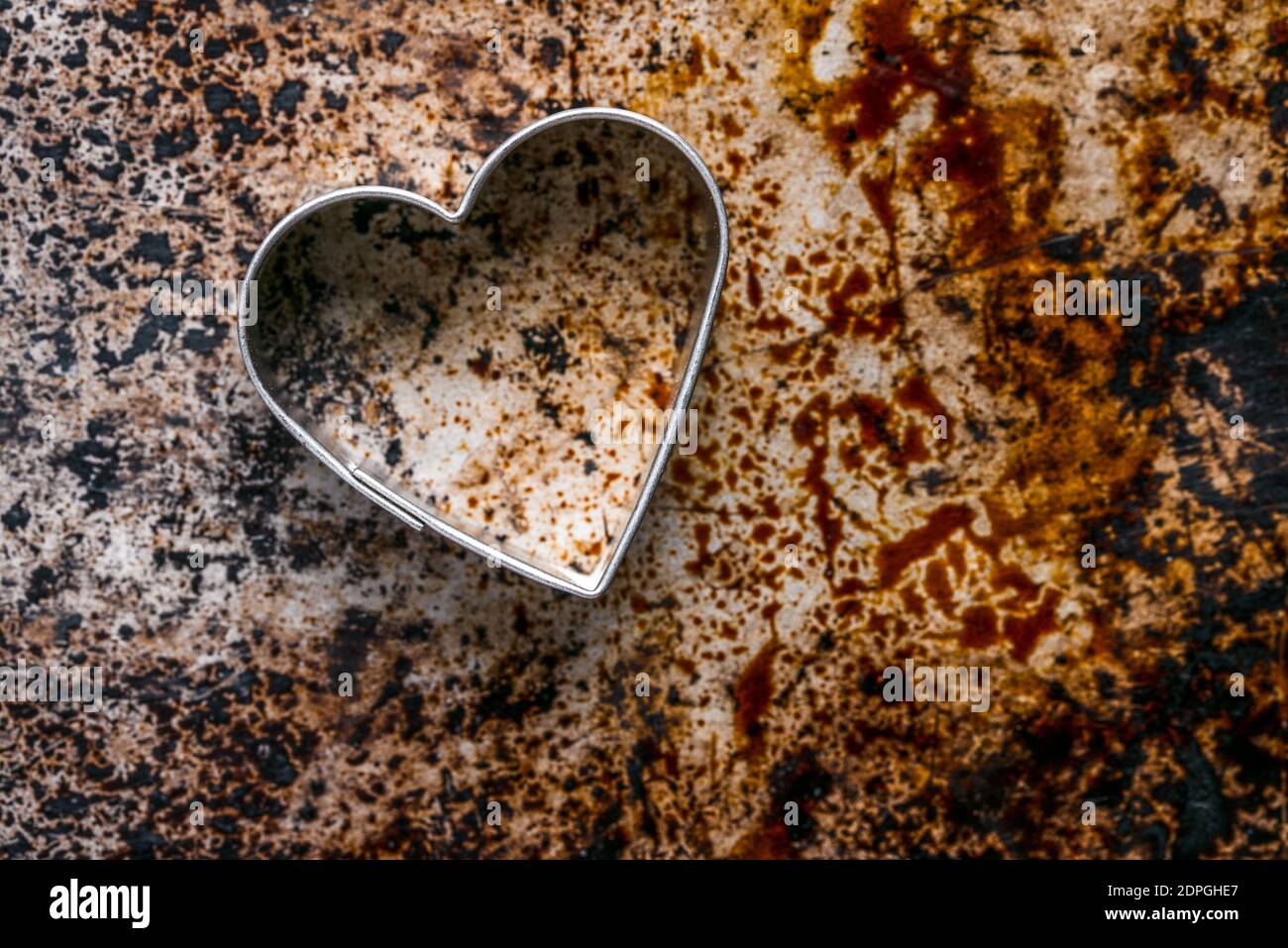 Heart Pastry Cutter on Rustic Baking Sheet Stock Photo - Alamy