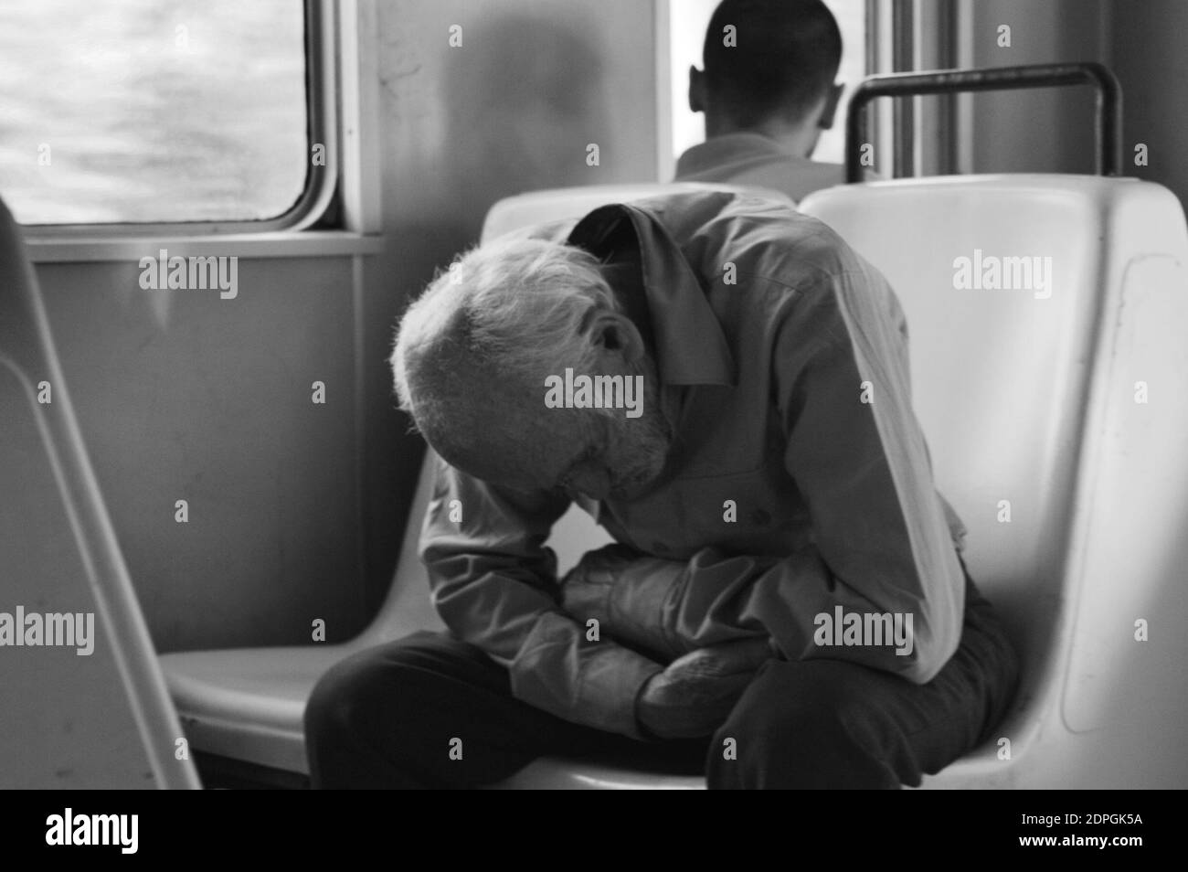 Man sitting train Black and White Stock Photos & Images - Alamy