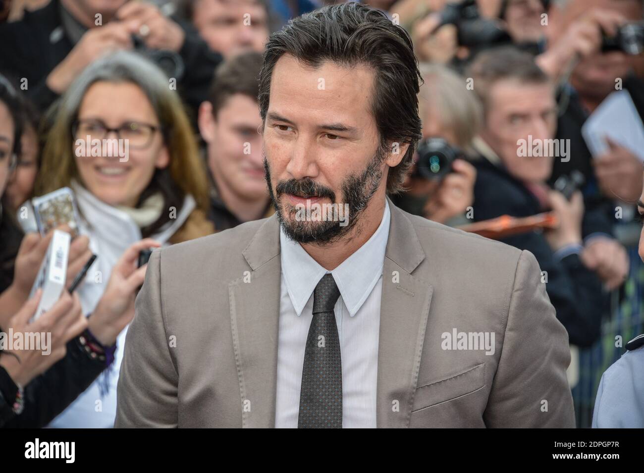 Keanu Reeves poses outside the beach cabin named after him as part of a ...
