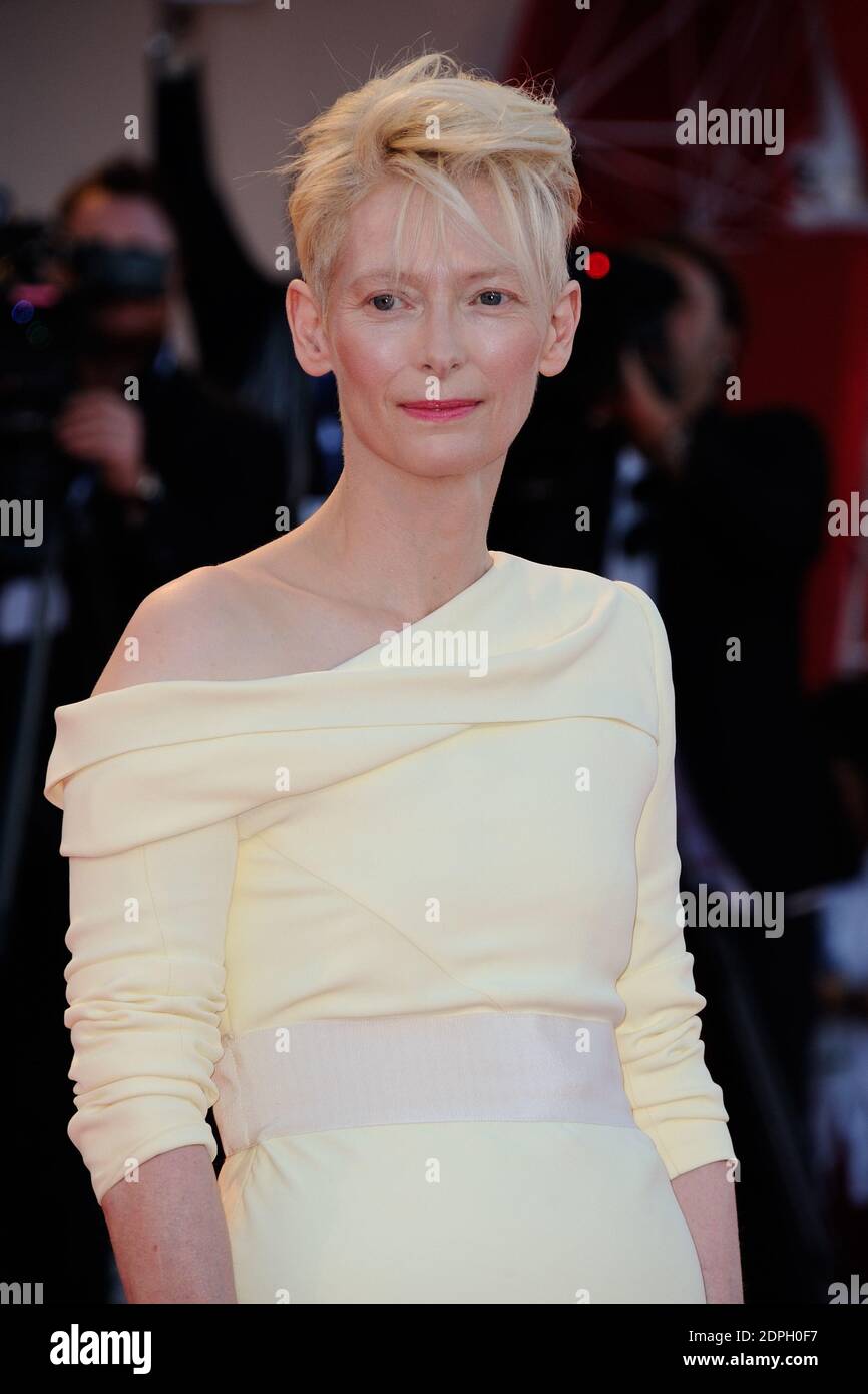 Tilda Swinton attending the premiere for the film A Bigger Splash as ...