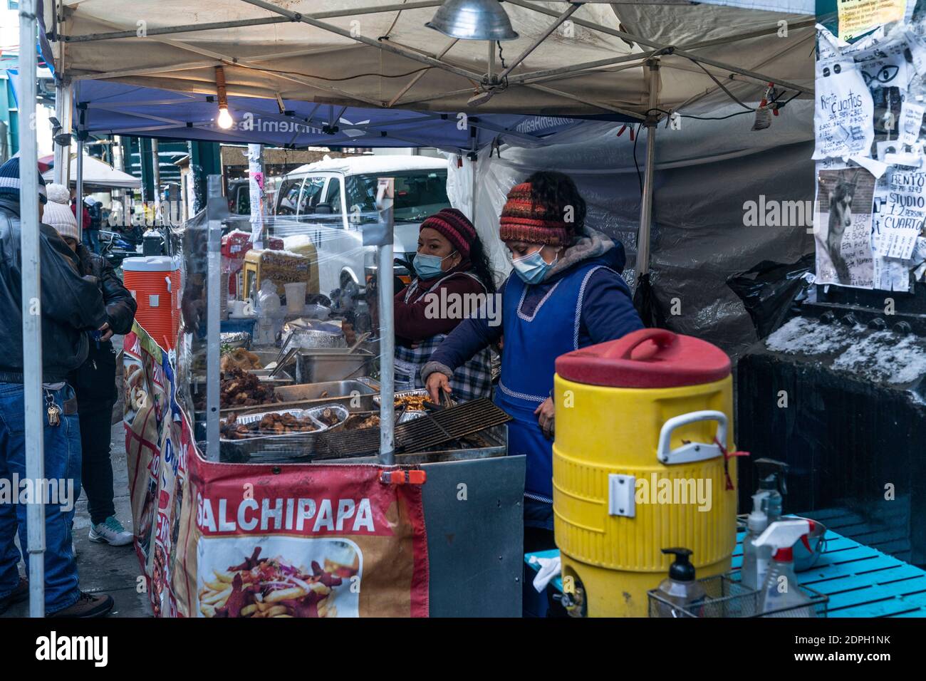 New York, NY - December 19, 2020: Street food vendors and customers ...