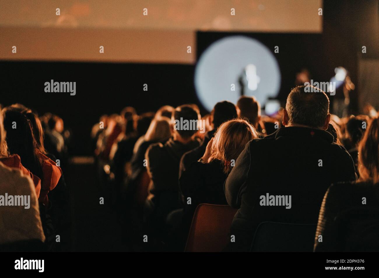 Rear view crowd at concert sitting hi-res stock photography and images ...