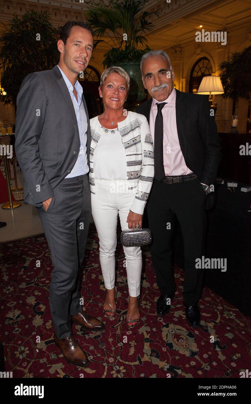 Michael Llodra, Mansour Bahrami and his wife attending Romain Grosjean ...