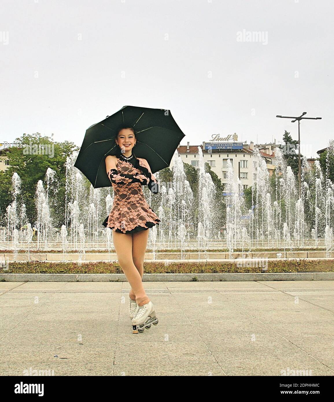 Girl dancing in rain umbrella hi-res stock photography and images - Alamy