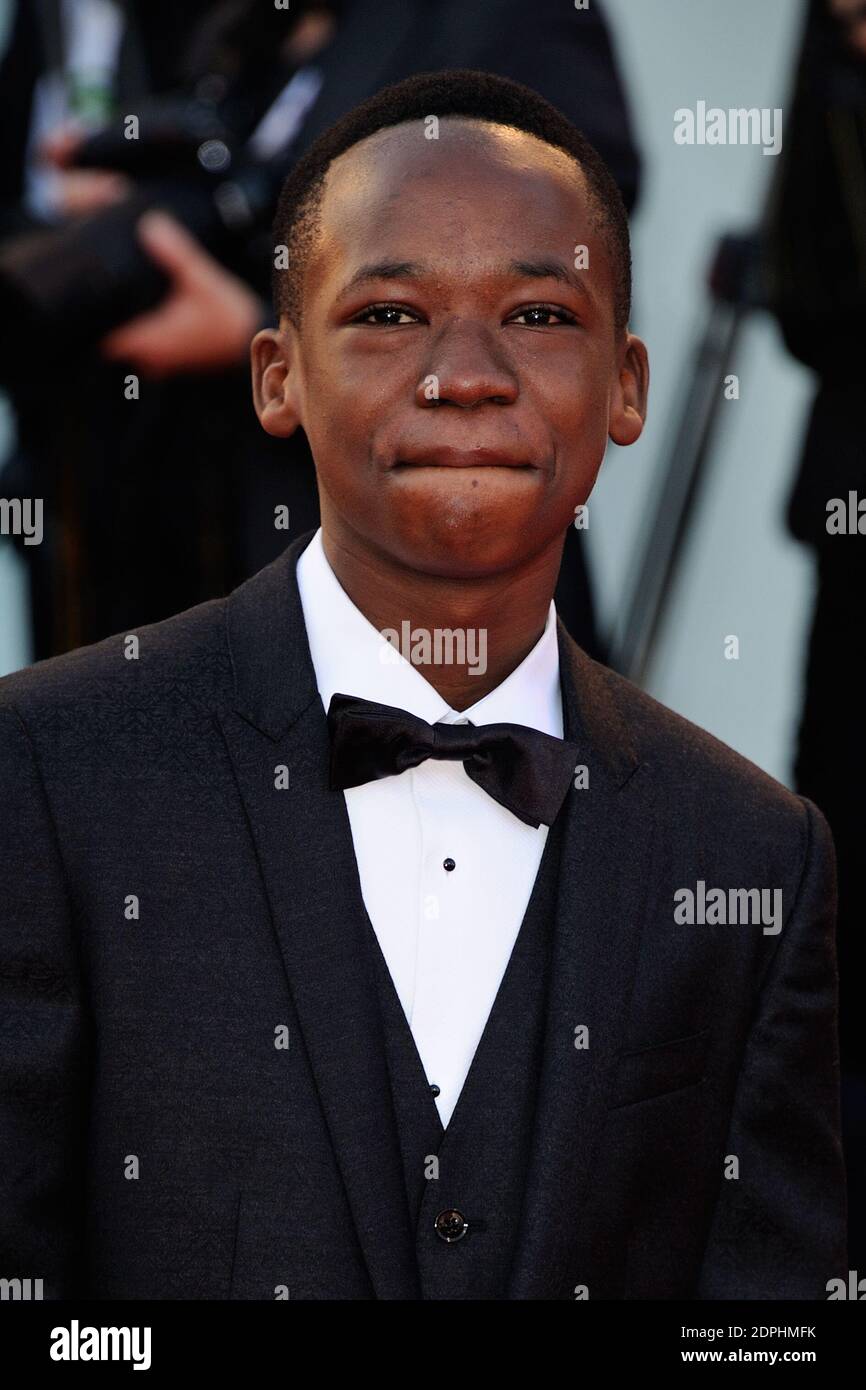 Actor Abraham Attah walking the red carpet as arriving at the closing ...