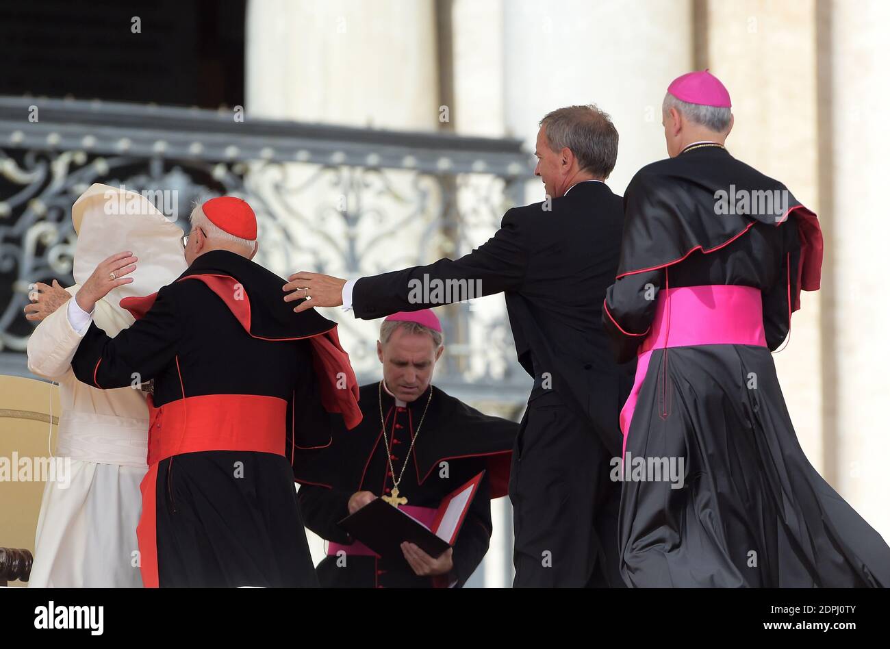 The wind blows the dress of Pope Francis as he leads his weekly general ...